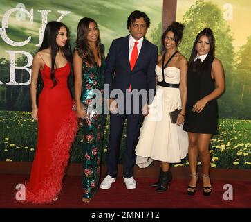 M. Night Shyamalan, (c), and daughters Saleka Shyamalan, (l), and ...