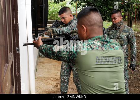 Philippine Marine Corps scout snipers and force reconnaissance Marines prepare a traditional ...