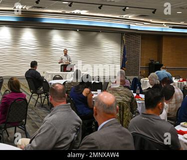 Col. Daniel Hoadley, 5th Bomb Wing commander, gives Mr. Paul Dean ...