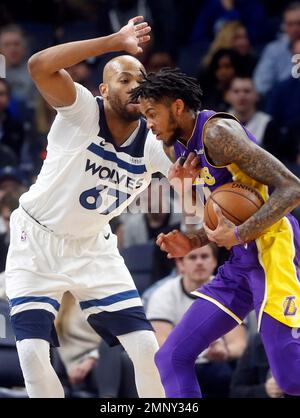 Minnesota Timberwolves' Taj Gibson, left, looks to shoot as Memphis ...