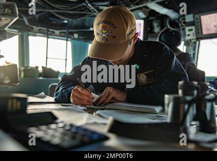 PENTLAND FIRTH STRAIT (Oct. 7, 2022) Ensign Benjamin Leaman writes in a ...