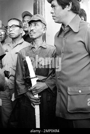 World War II Japanese straggler Hiroo Onoda, center, exchanges a toast ...