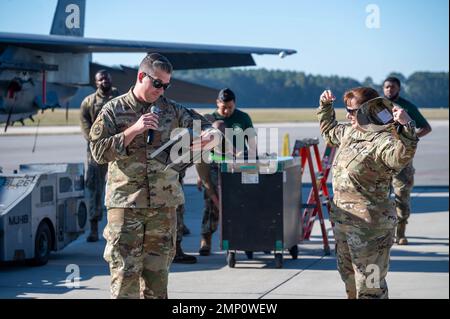 Tech. Sgt. Cody Jurgensmeyer (left), 4th Maintenance Group load ...
