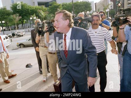 The defense attorney for Manuel Noriega, Frank Rubino, right, throws ...