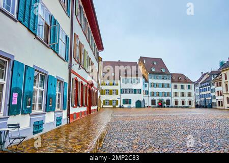 BASEL, SWITZERLAND - APRIL 1, 2022: Munsterplatz pedestrian sqaure with ...