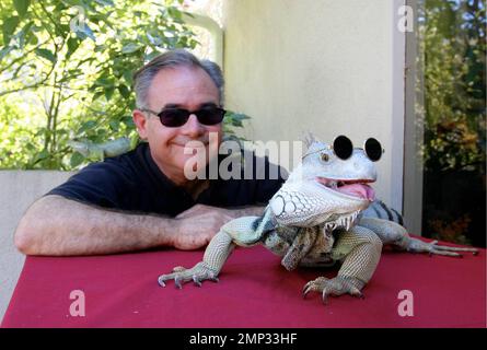 Exclusive!! Henry Lizardlover snuggles up with some of his lizard ...