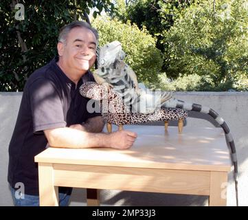 Exclusive!! Henry Lizardlover snuggles up with some of his lizard ...