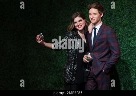 Madame Tussauds worker Carlotta Morelli, left, poses with the new wax ...