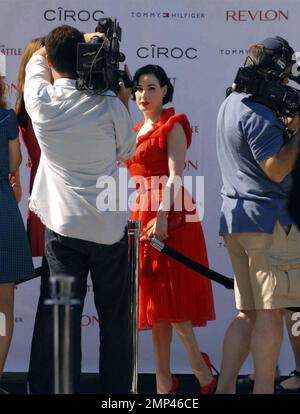 Dita Von Teese, Charlize Theron and Gabrielle Reece (with daughter ...
