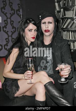Marilyn Manson, with his new girlfriend model Isani Griffith, attends a ...