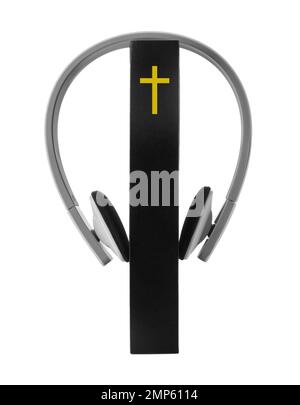 Holy Bible and modern headphones on white background Stock Photo - Alamy