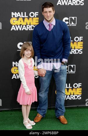 NFL Quarterback Tim Tebow with Tim Tebow Foundation winner Presley ...
