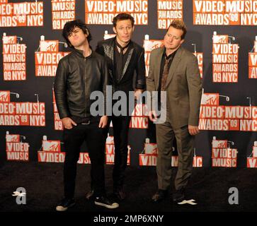 Mike Dirnt of Green Day attends a ceremony honoring Green Day with a ...