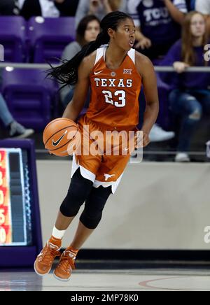 Texas guard Ariel Atkins (23) and Oklahoma State guard Areanna Combs ...