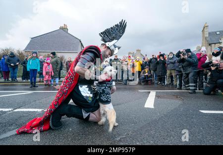 Guizer Jarl Neil Moncrieff with his dog Tayla as members of the Jarl ...