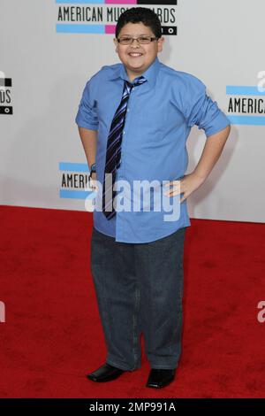 Rico Rodriguez walks the red carpet at the premiere of "Toy Story 3 ...