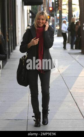EXCLUSIVE!! Actress Amy Smart bundles up in a grey coat and red scarf ...