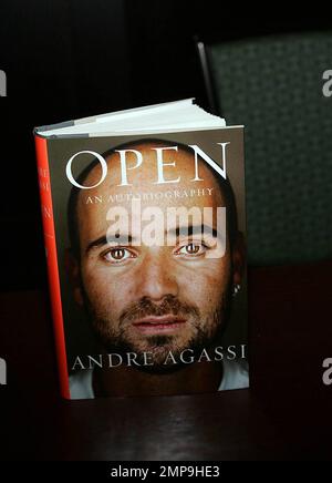 Tennis great Andre Agassi signs copies of his new book "Open: An ...