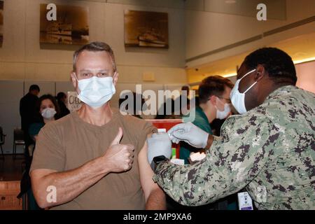 Navy Capt. Felix (Drew) Bigby, acting director of Walter Reed National ...