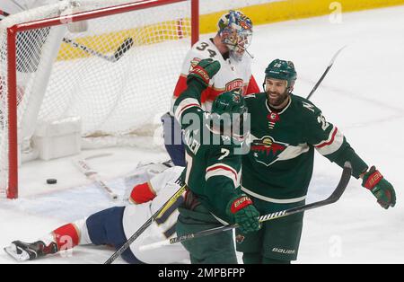 Minnesota Wild's Daniel Winnik, right, gets upended between St. Louis ...