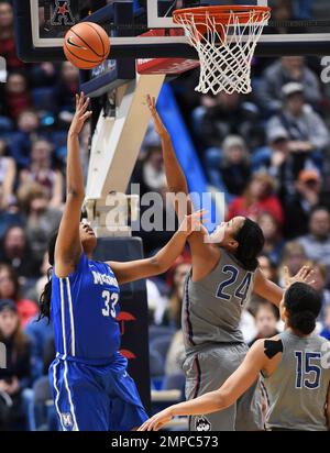 Connecticut's Napheesa Collier (24) attempts to block a shot by Memphis ...
