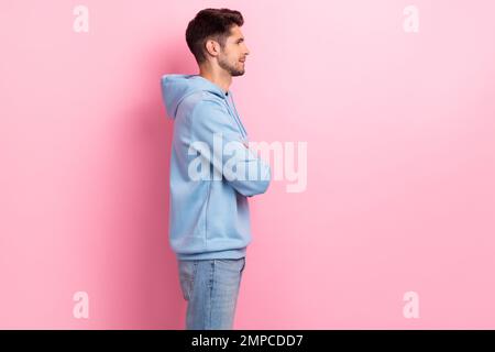 Profile photo of positive guy folded hands beaming smile look empty ...