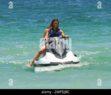 Kelly Bensimon and her cute daughter Thadeus take a jet ski out into ...