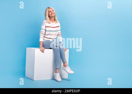 Photo of adorable interested businesswoman look blank space ...