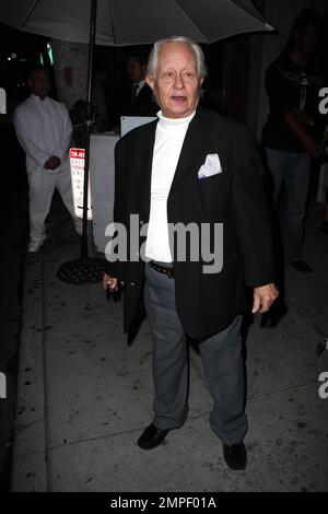 Former professional golfer Bob May poses for photos outside the ...