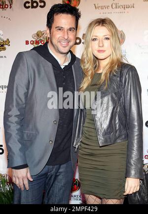 Actors Jonathan Silverman and wife Jennifer Finnegan attend the grand ...