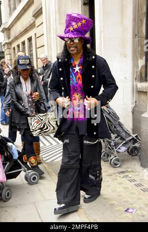 Always the flasy dresser, funk music legend Bootsy Collins wears a big ...