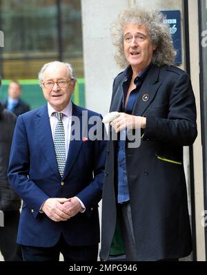 Actor and broadcaster David Jacobs CBE and Queen's Brian May pose for ...