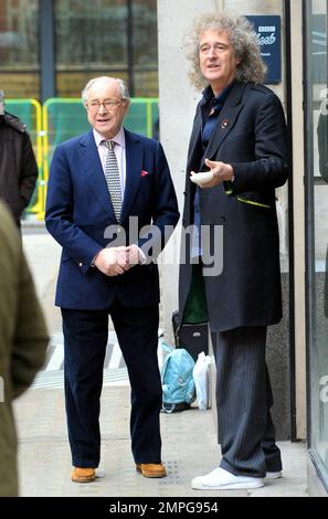 Actor and broadcaster David Jacobs CBE and Queen's Brian May pose for ...