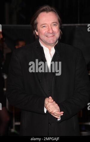 Neil Pearson poses on the red carpet at the European premiere of ...