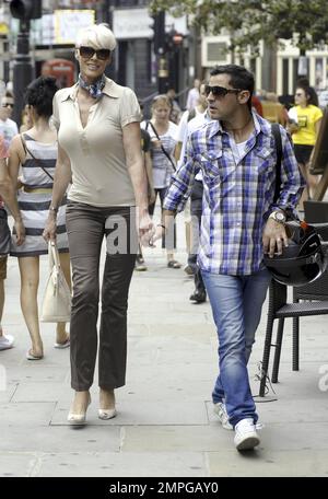 Brigitte Nielsen and her husband walk hand-in-hand while out for a ...