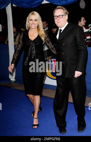Vic Reeves and Nancy Sorrell arrive with their twin daughters Elizabeth ...