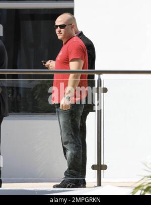 Britney Spears' bodyguard Edan Yemini stands outside of a Miami hotel ...