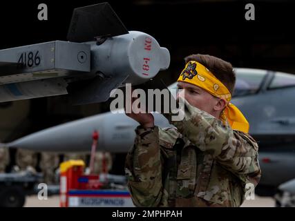 Airman 1st Class Kyle Schulze, 80th Fighter Generation Squadron weapons ...