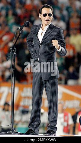 Marc Anthony performs the National Anthem prior to the start of the ...
