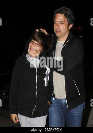 Actor Ray Romano goofs around with his son Joseph as they arrive at ...