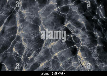 Abstract photo of glowing surface of transparent water with light ...