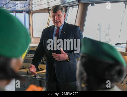 LUANDA, Angola (Nov. 3, 2022) Mr. Joseph Darlak, right, ship’s master ...
