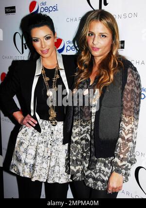 Kim Kardashian backstage at the Charlotte Ronson Fall 2011 fashion show ...