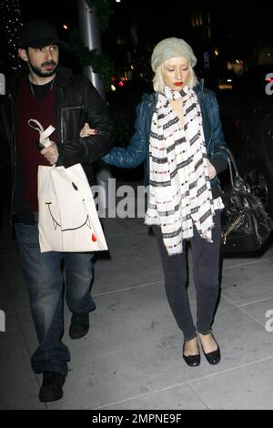 Christina Aguilera looks sullen as she leaves dinner at La Scala with ...