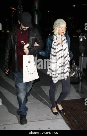 Christina Aguilera looks sullen as she leaves dinner at La Scala with ...