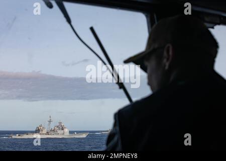 Executive Officer Cmdr. Cameron Ingram oversees the bridge team in the ...