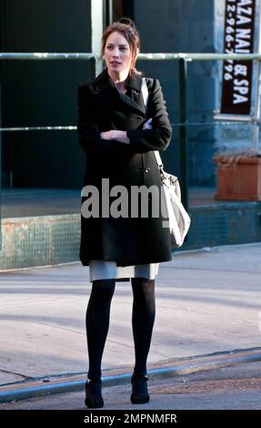 Supermodel Christy Turlington looks chilly as she waits for a taxi in ...