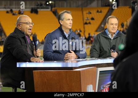 NBC Sunday Night Football announcers Chris Colliningsworth, center, and ...