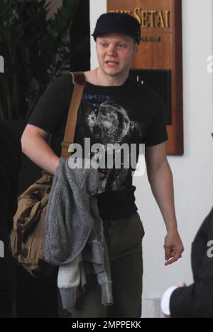 Pop band 'Coldplay' band members Guy Berryman, Jonny Buckland and Will ...