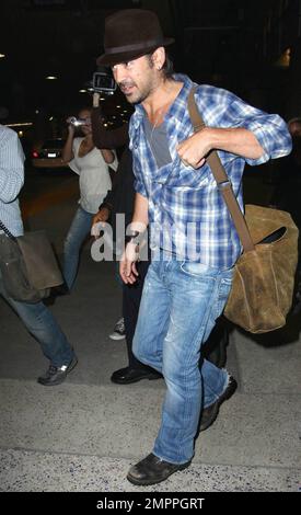 Colin Farrell arrives all smiles at LAX after a short four day break in ...